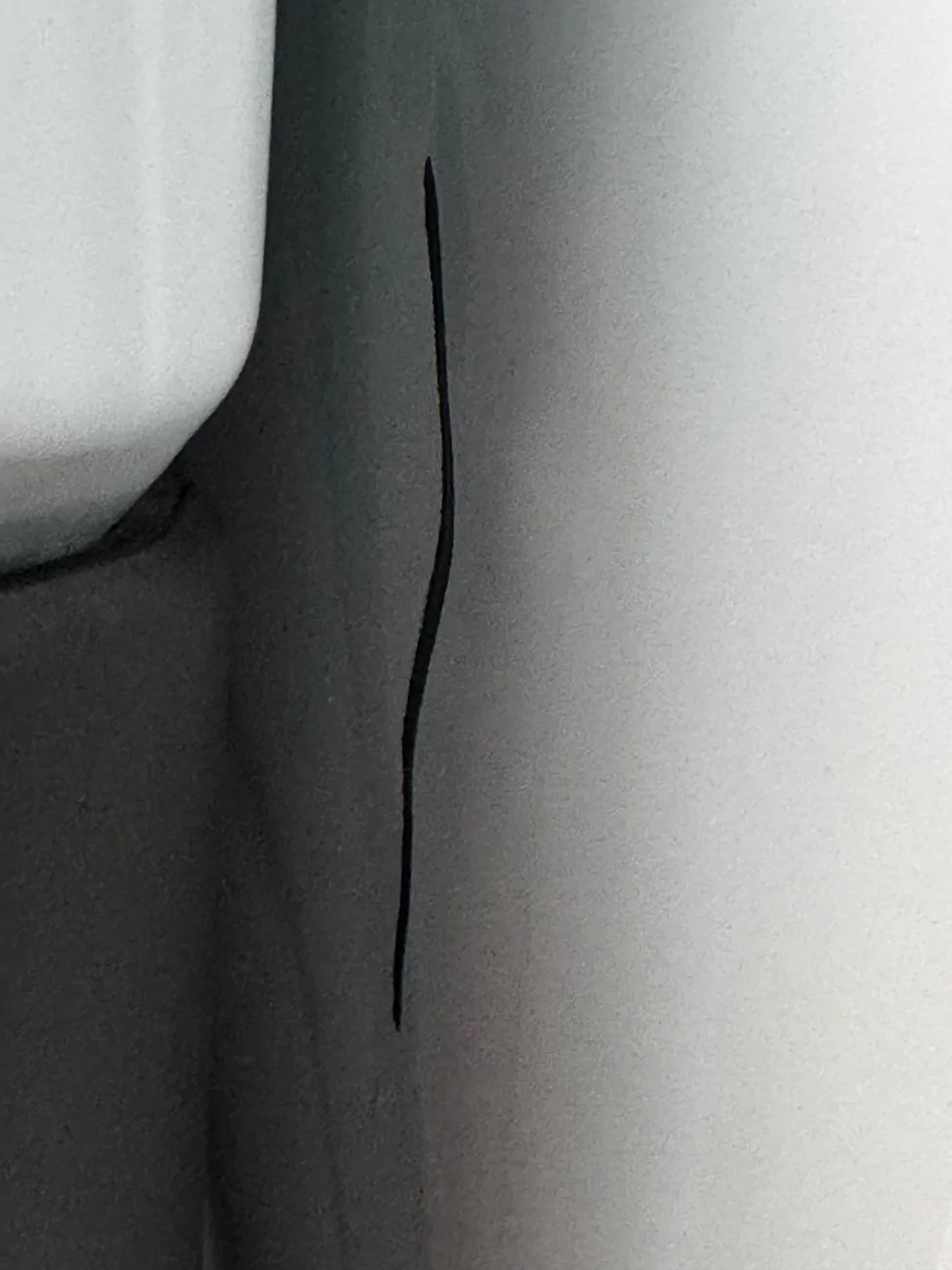 Detailer found this HUGE gash and dent in between the cab and bed from ...