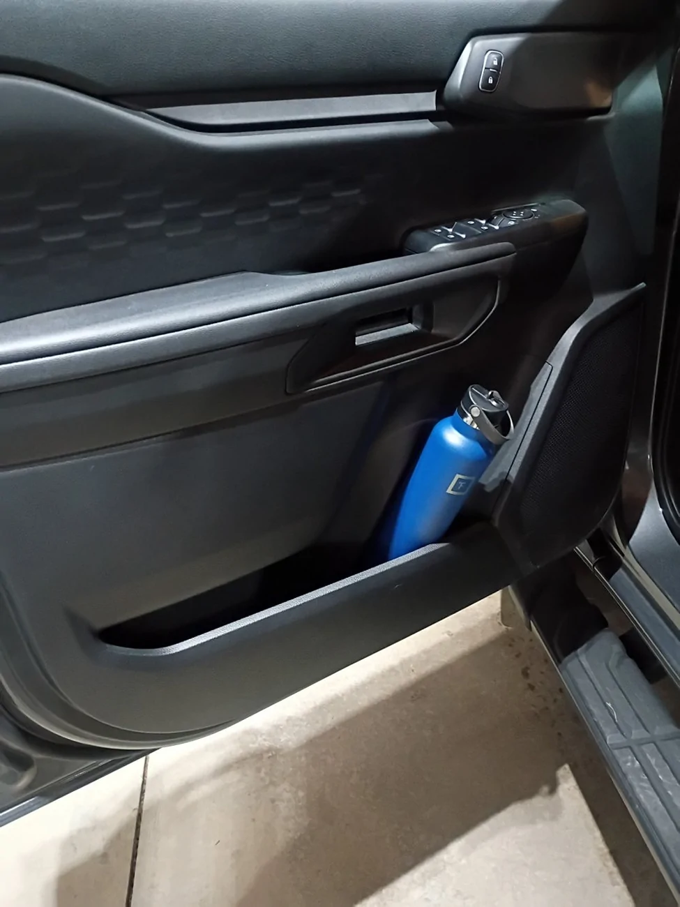 Door cubby water bottle | Ranger6G - 2024+ Ranger & Raptor Forum, News ...